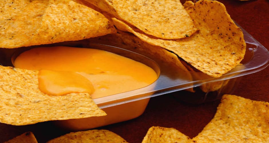The Dirty Truth About Nacho Cheese | First We Feast